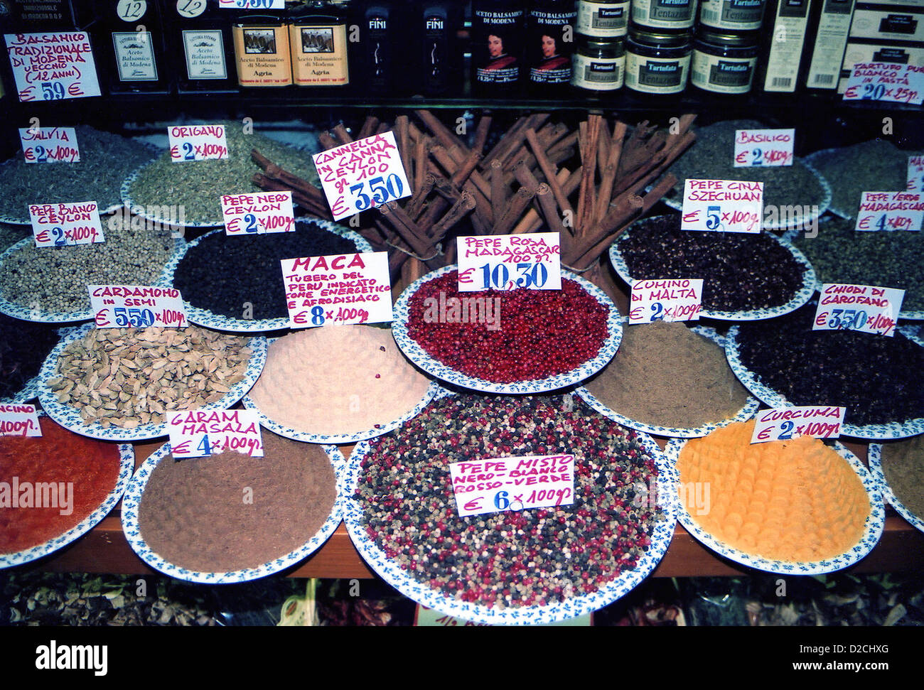 A selection of different spices on display in a front window Stock ...