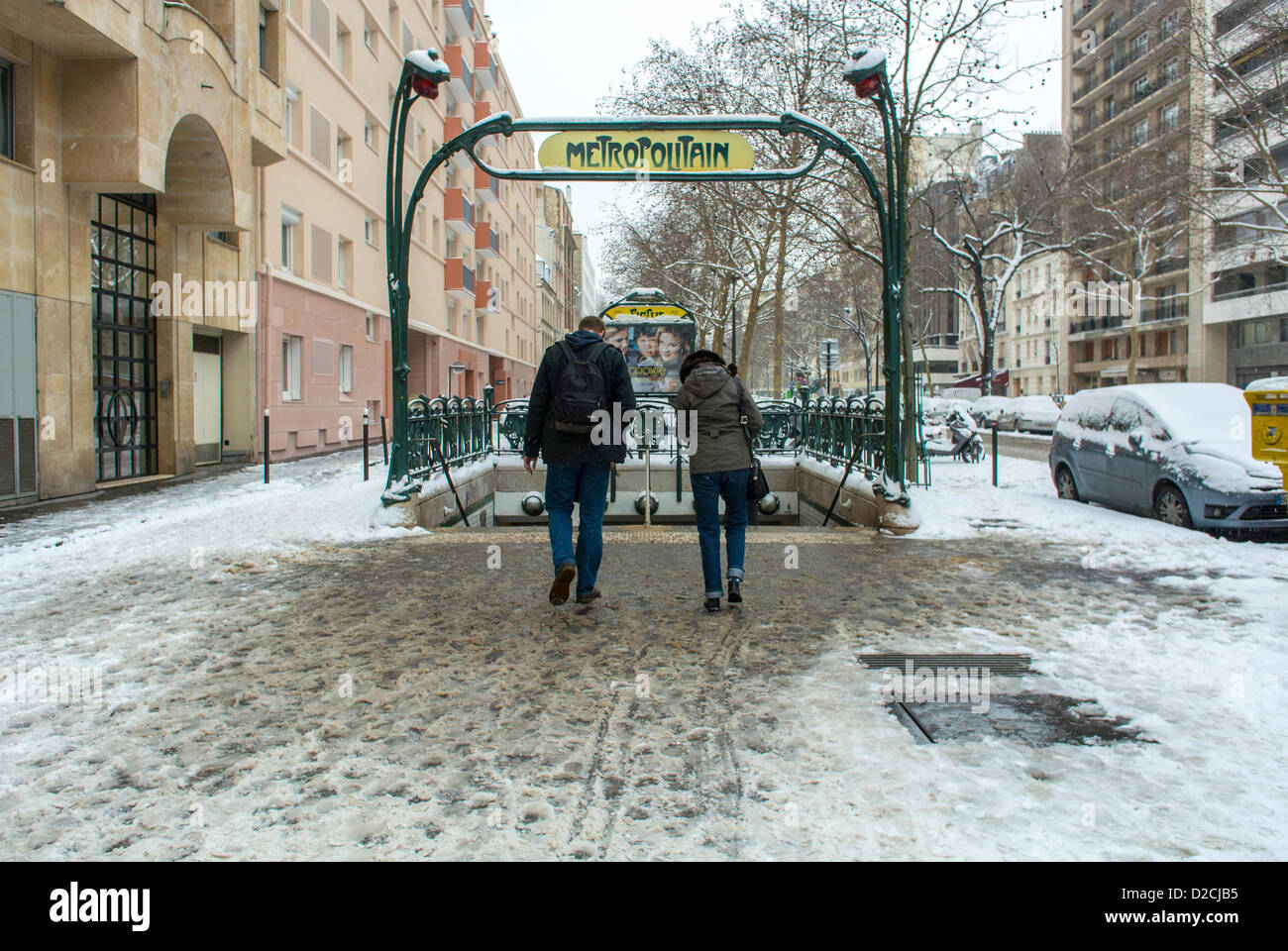 Paris, France, Two People Walking in snow, to Picpus Metro Station ...