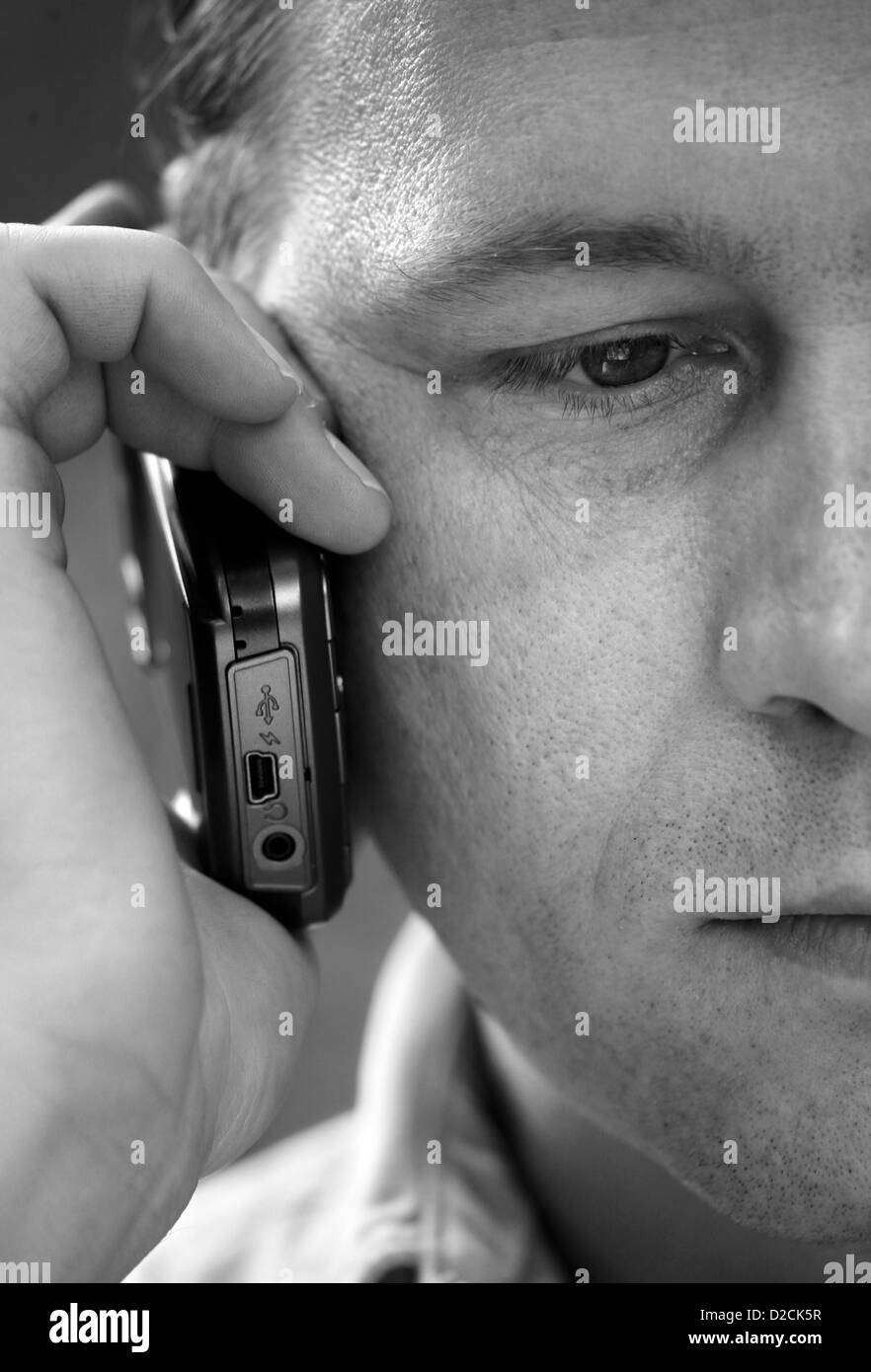 Portrait of the man with the phone close-up Stock Photo - Alamy