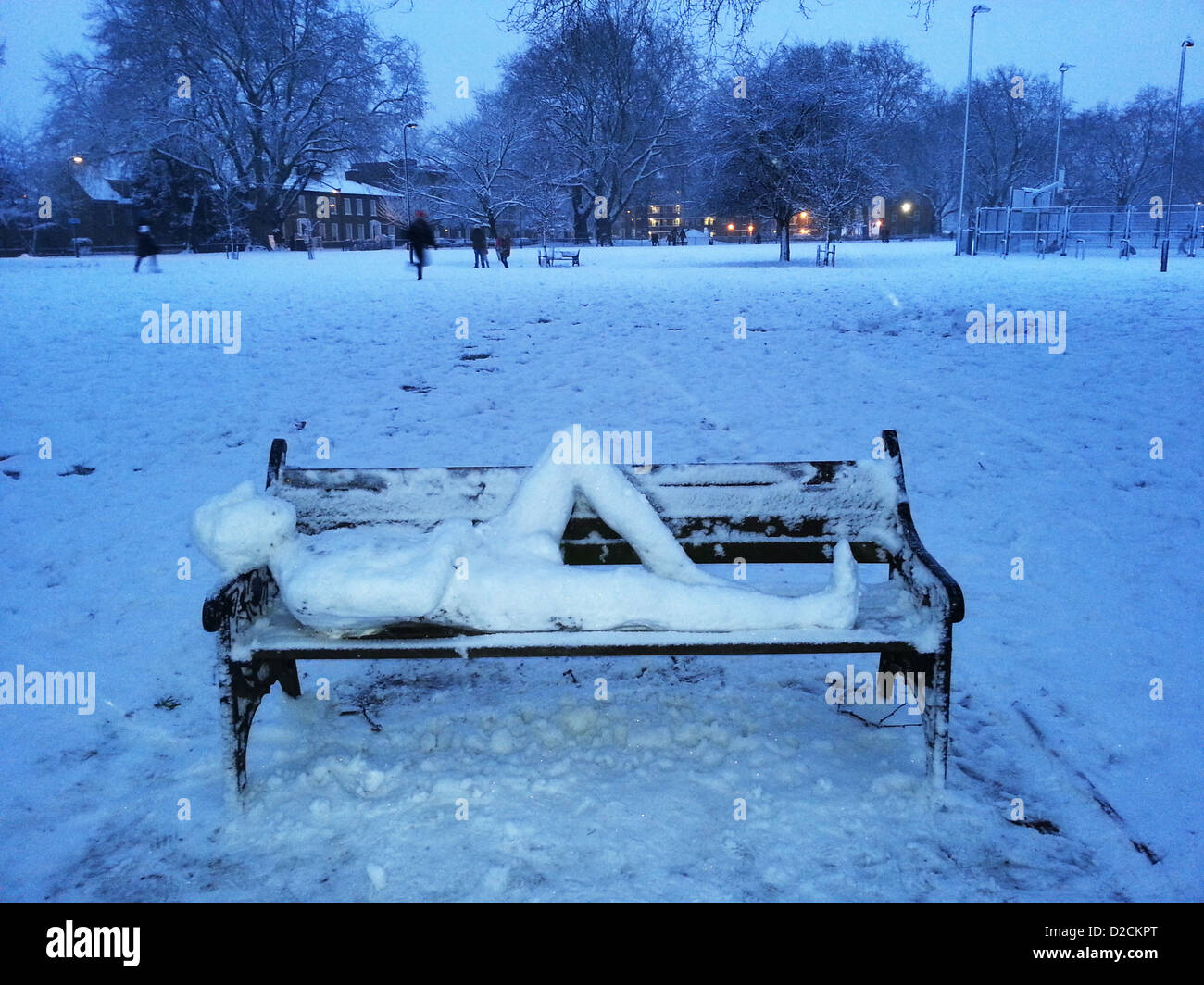 Snowman chilling on a bench in London Fields, East London Stock Photo ...