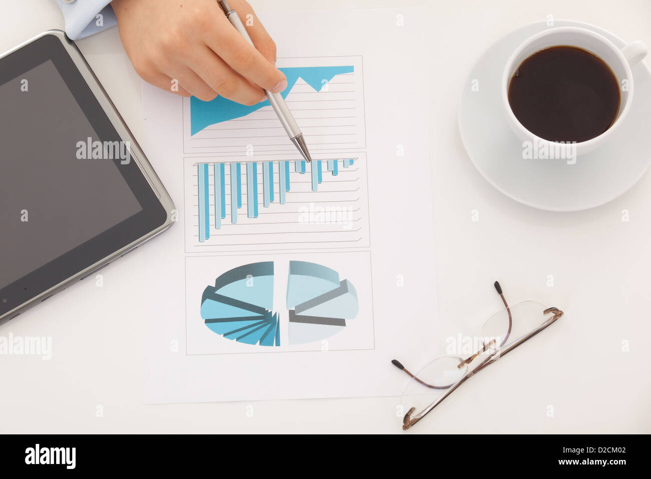 financial charts and graphs on the table Stock Photo - Alamy