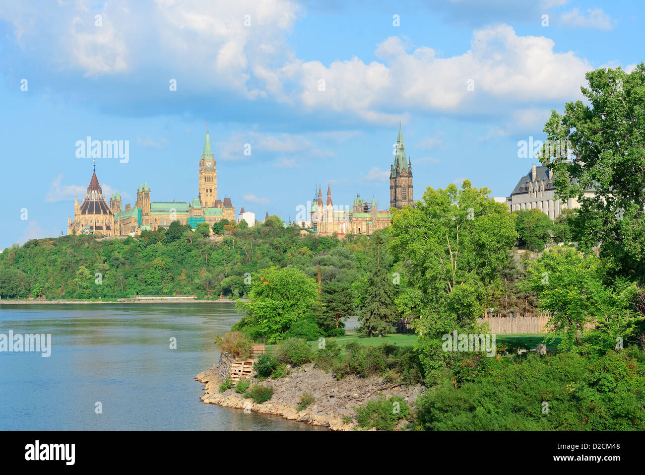 Ottawa cityscape in the day over river with historical architecture ...
