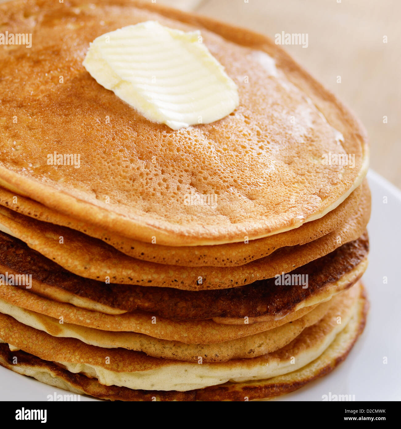 White plate with pancakes stack on the wooden table Stock Photo - Alamy