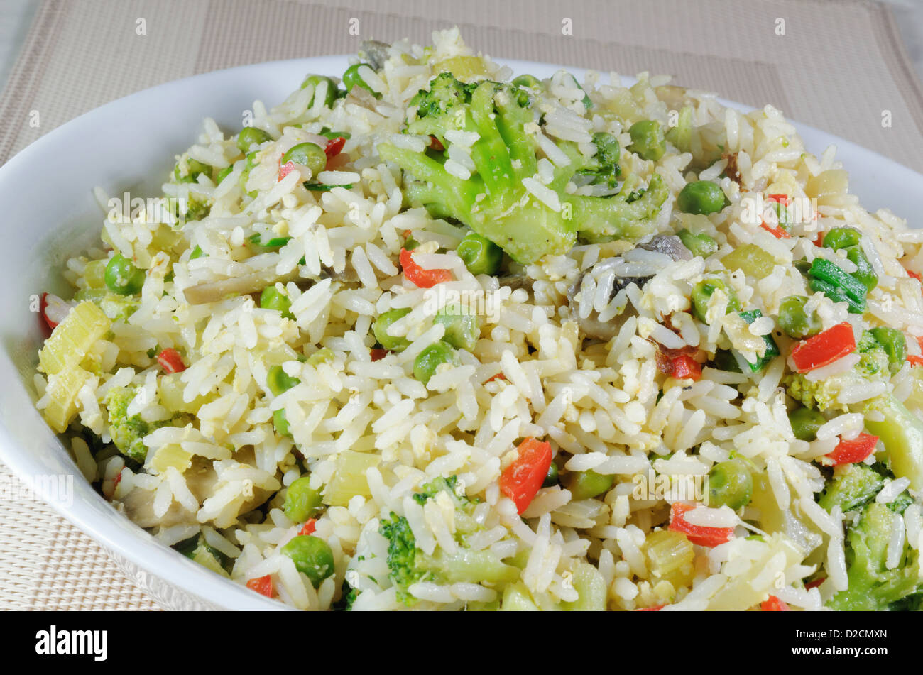 A bowl of homemade vegetable fried rice Stock Photo - Alamy