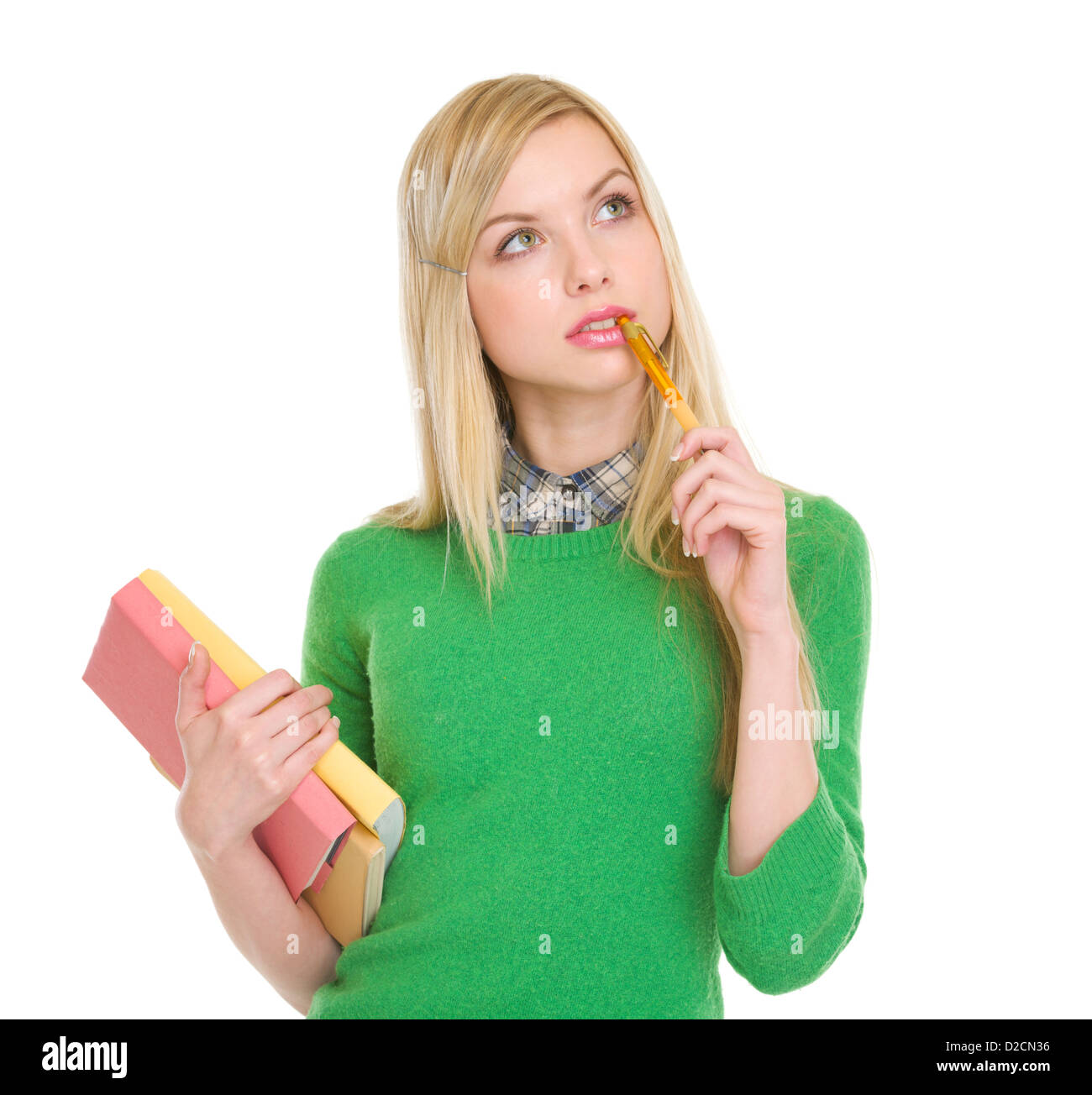 Thoughtful student girl with books Stock Photo - Alamy