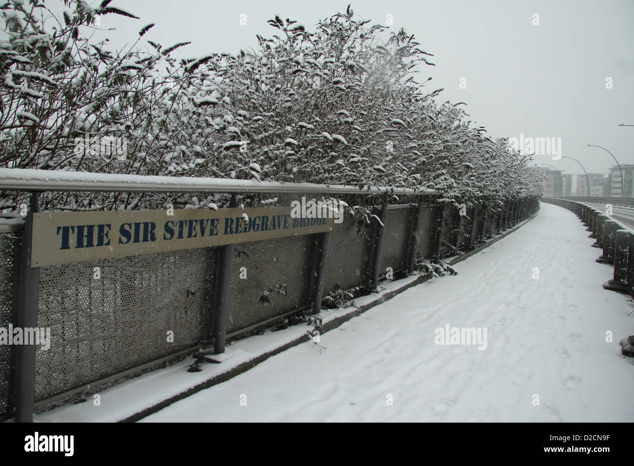 The Sir Steve Redgrave Bridge pedestrian pathway was covered with snow ...