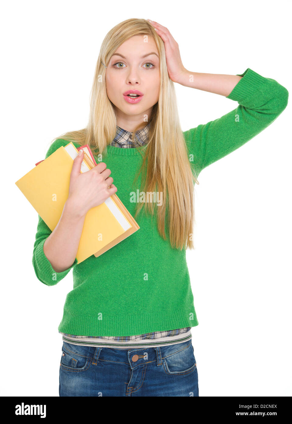 Surprised student girl with books Stock Photo - Alamy