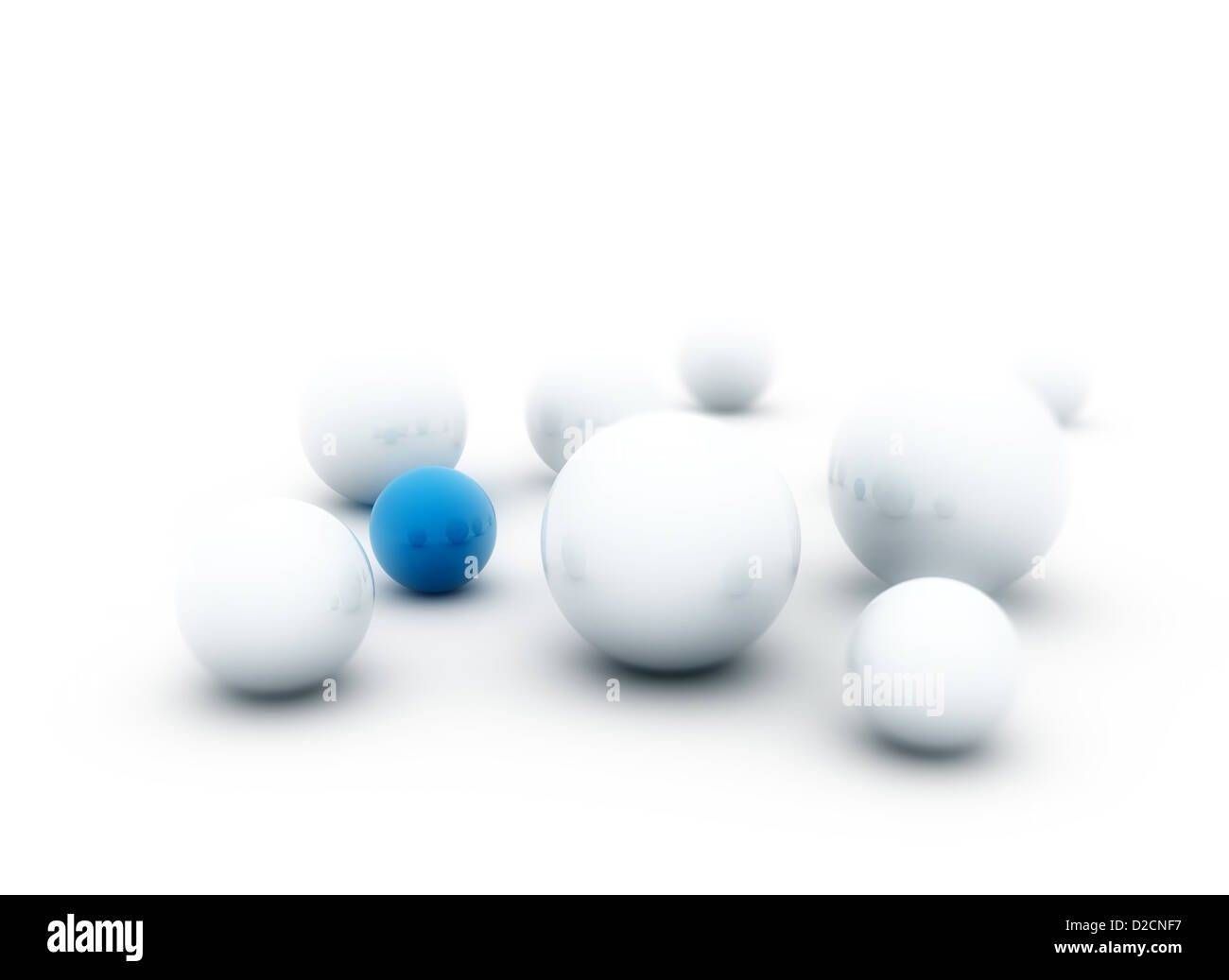 One small blue spheres standing out Stock Photo - Alamy