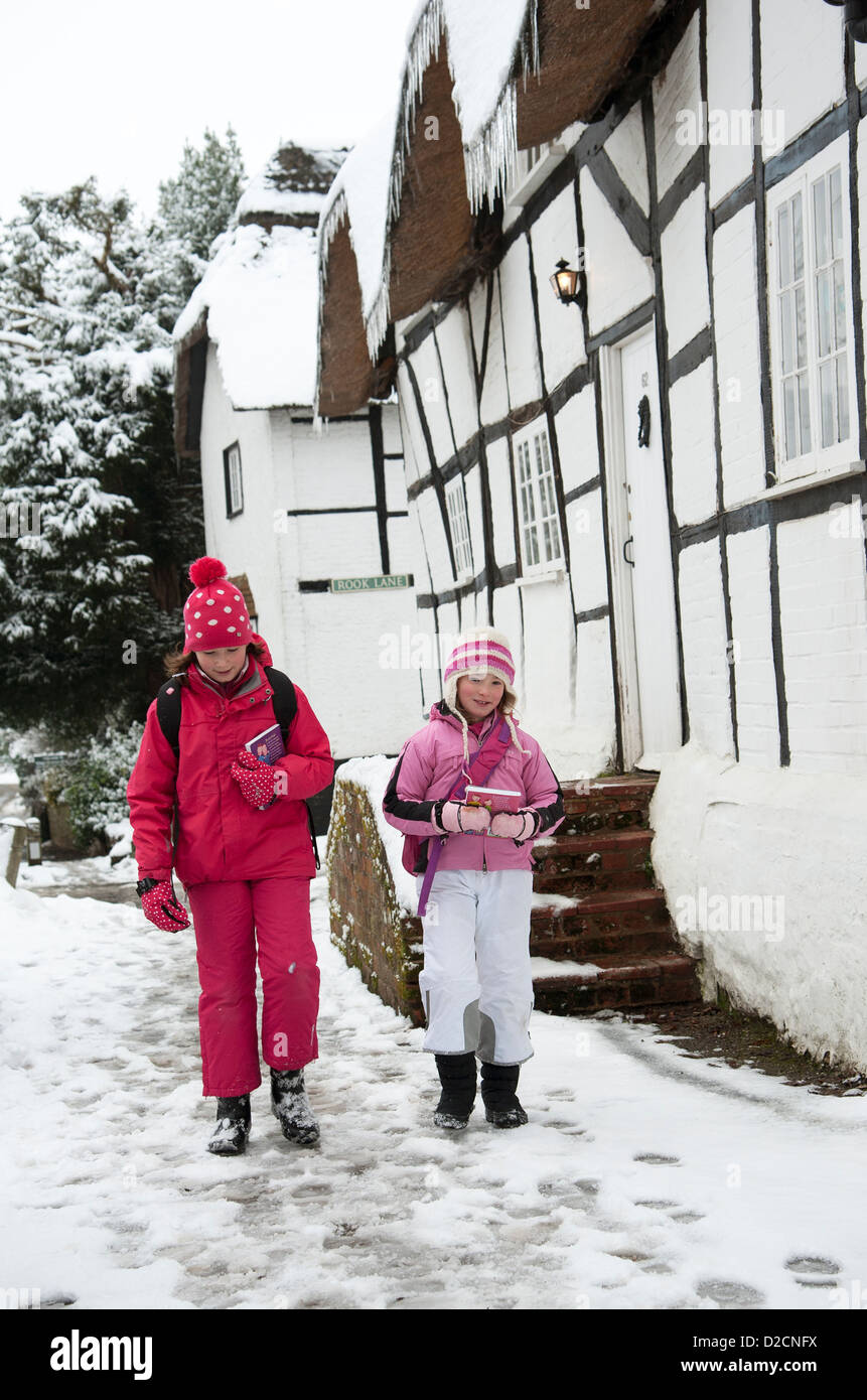 Walking to school on a cold winter morning with pavement covered in ice ...