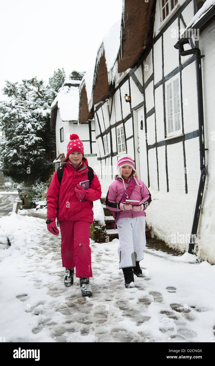 Walking to school on a cold winter morning with pavement covered in ice ...