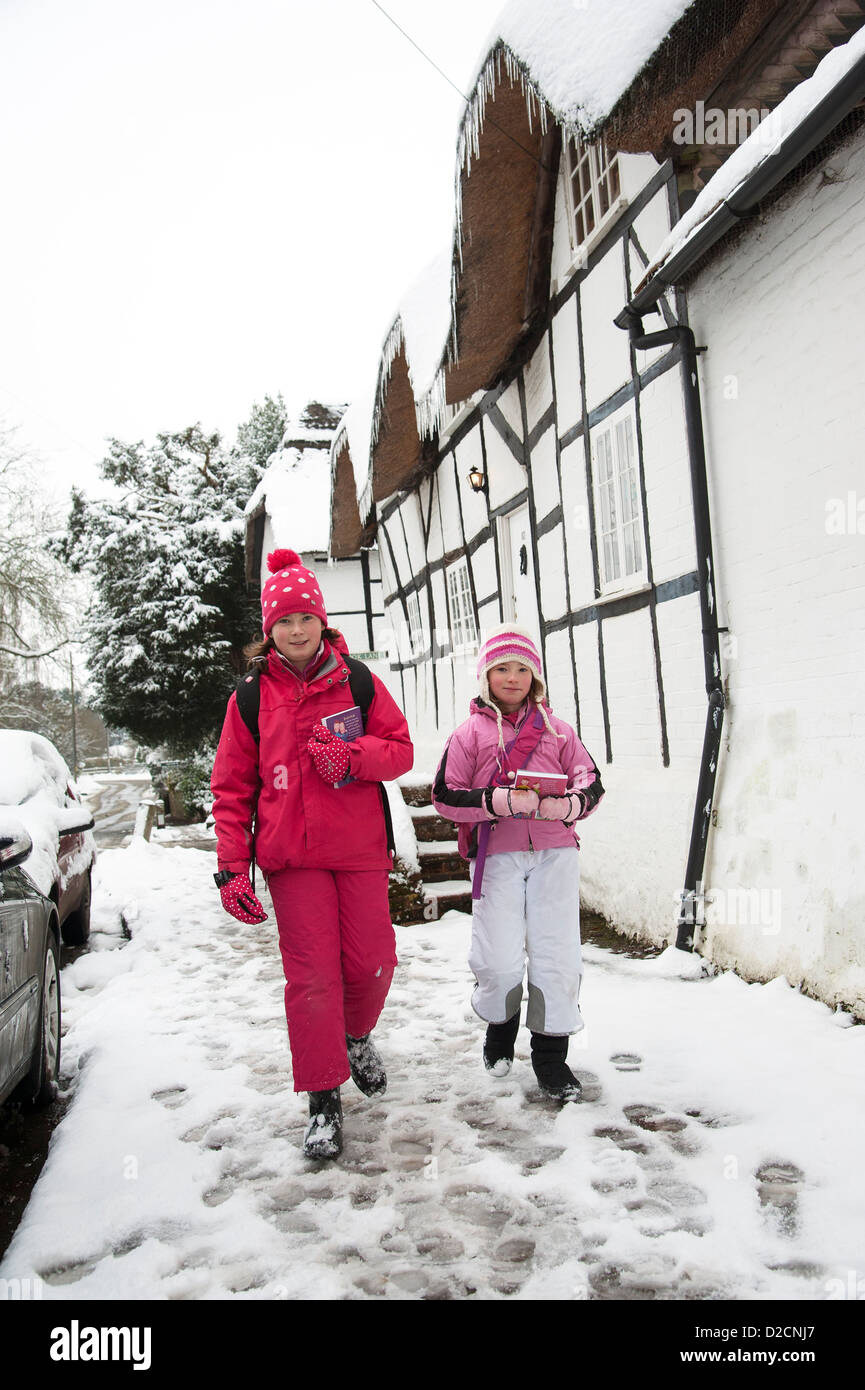 Walking to school on a cold winter morning with pavement covered in ice ...