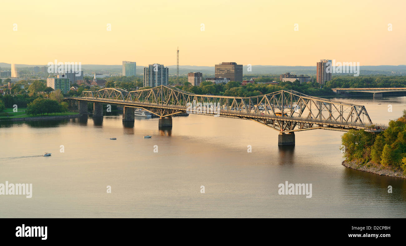 Alexandra Bridge over river in Ottawa at sunset Stock Photo - Alamy