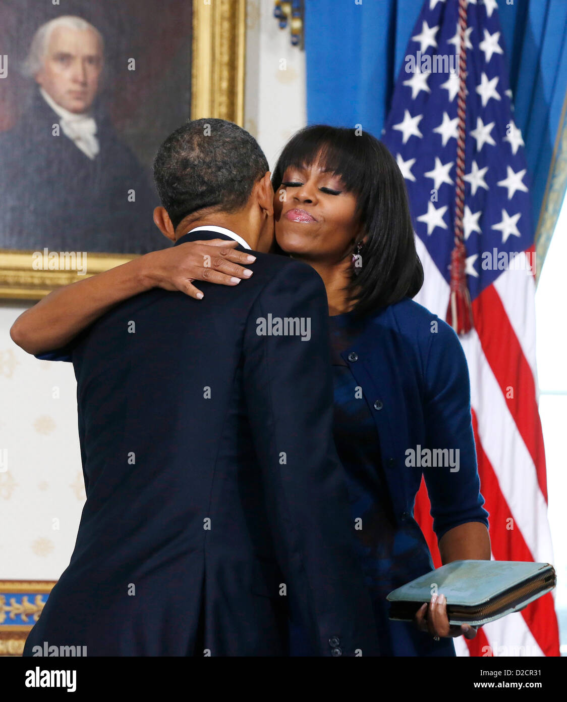 United States President Barack Obama (L) gets a hug from first lady ...