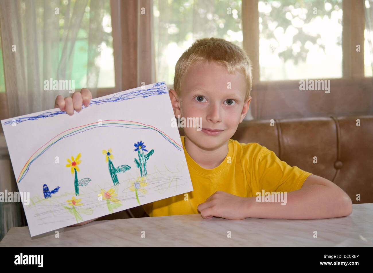 young smiling boy showing his positive picture Stock Photo - Alamy