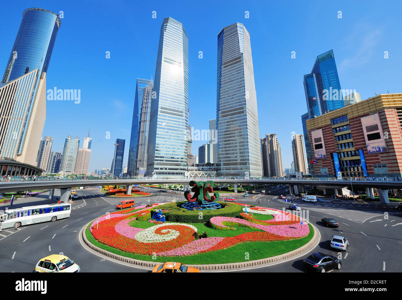 Shanghai street view with skyscrapers, roundabout and blue sky Stock ...