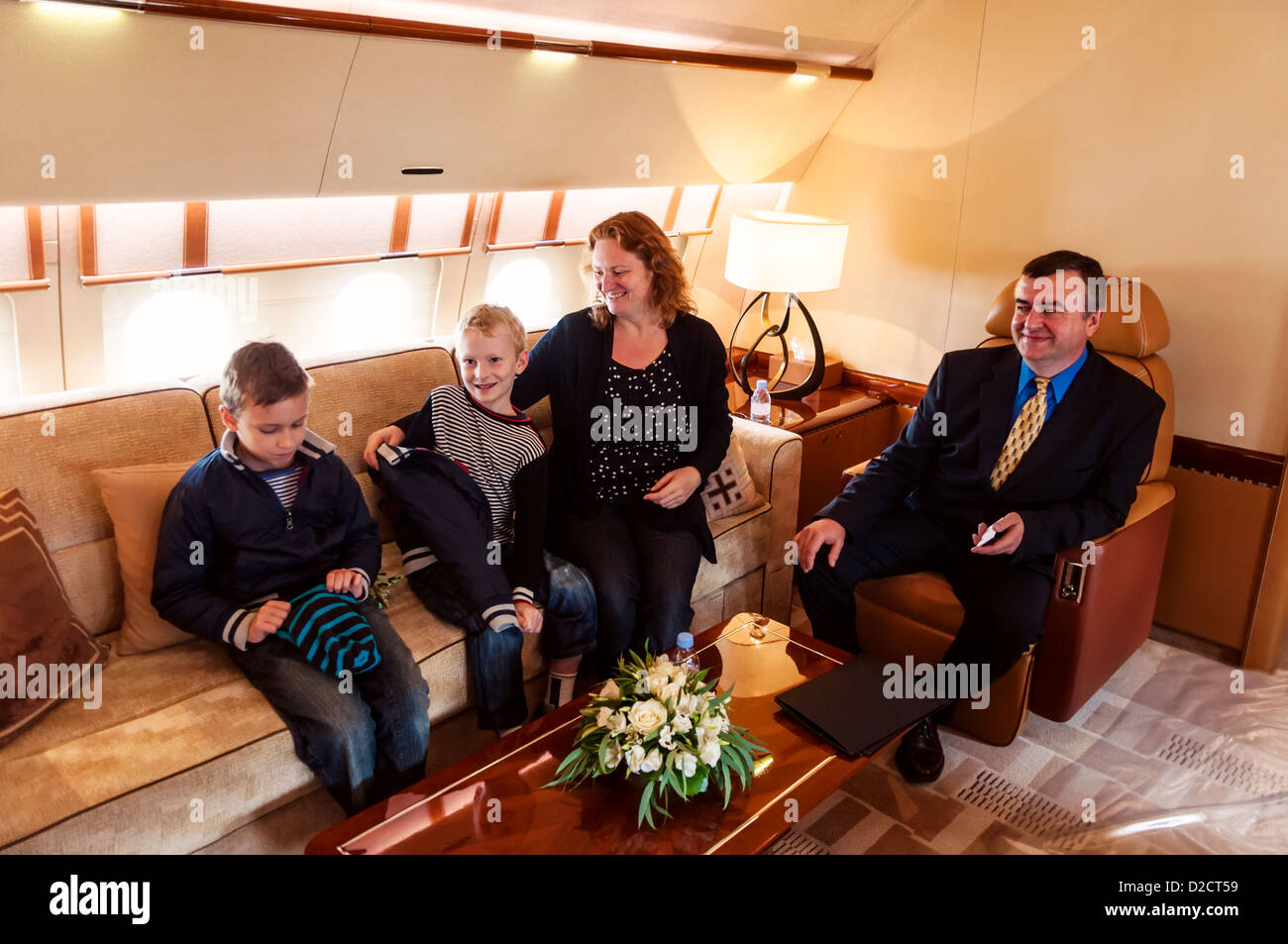 Family traveling by private jet hi-res stock photography and images - Alamy