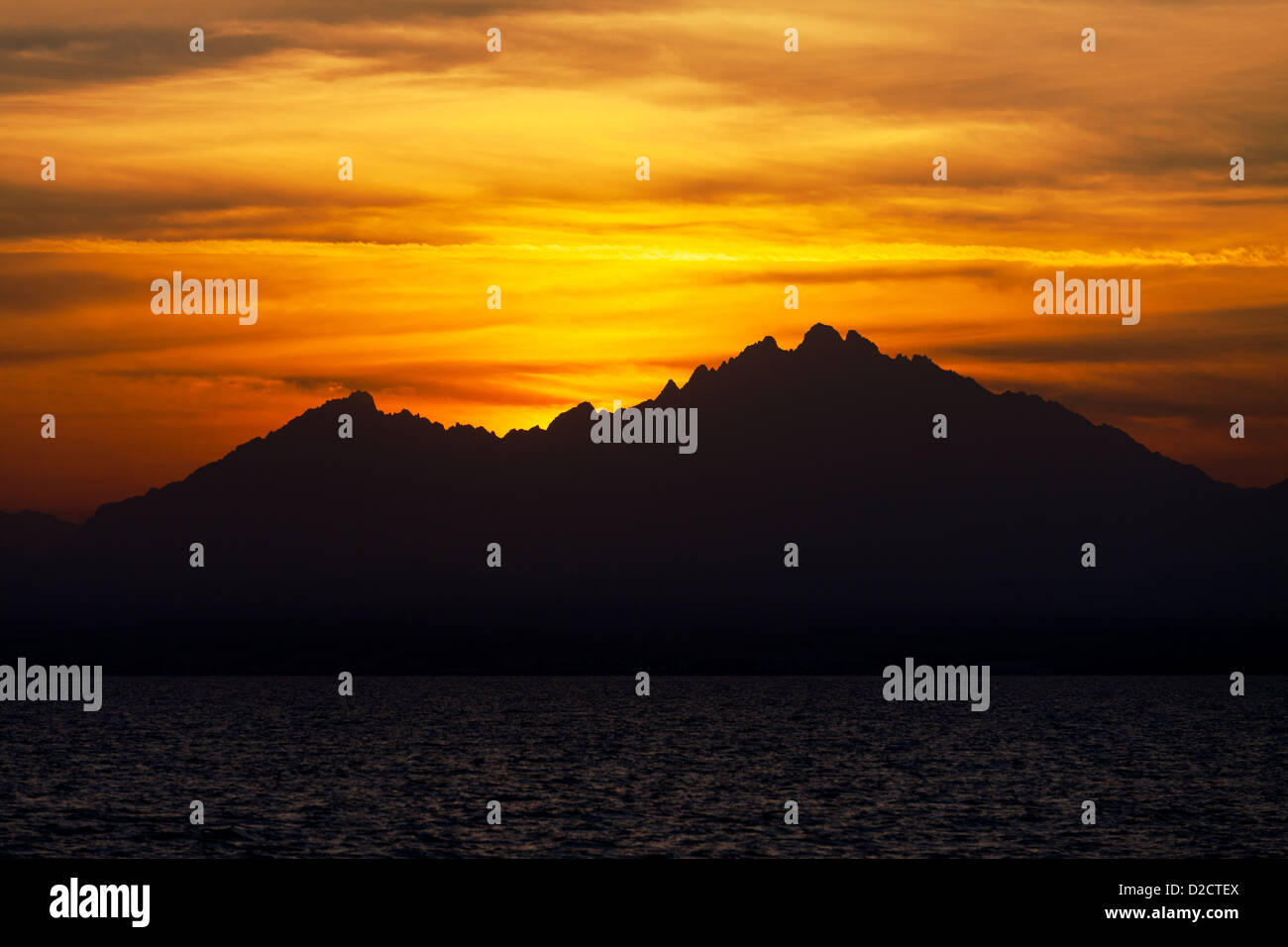 Romantic View of a Sunset over a Mountains Stock Photo - Alamy