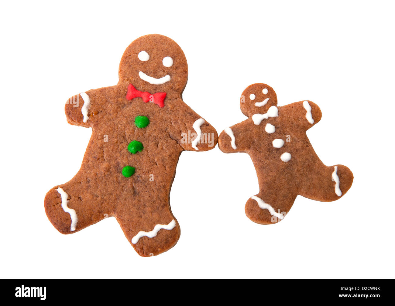 Two gingerbread men isolated on white background Stock Photo - Alamy