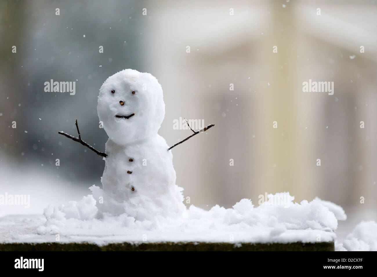A tiny snowman on a pedestal in the grounds of Chiswick House Stock ...