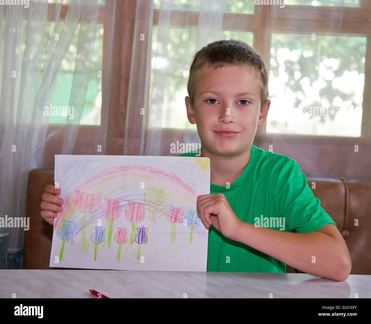 young smiling boy showing his positive picture Stock Photo - Alamy