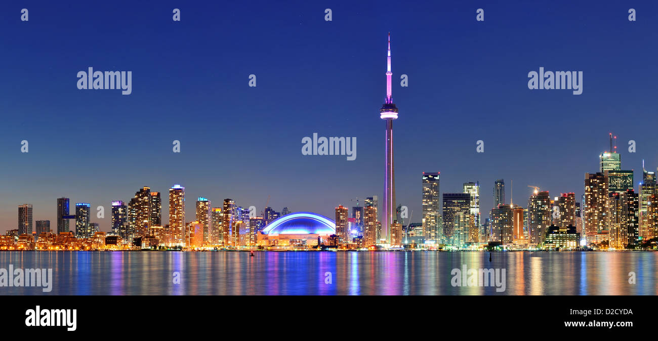 Toronto cityscape panorama at dusk over lake with colorful light Stock ...