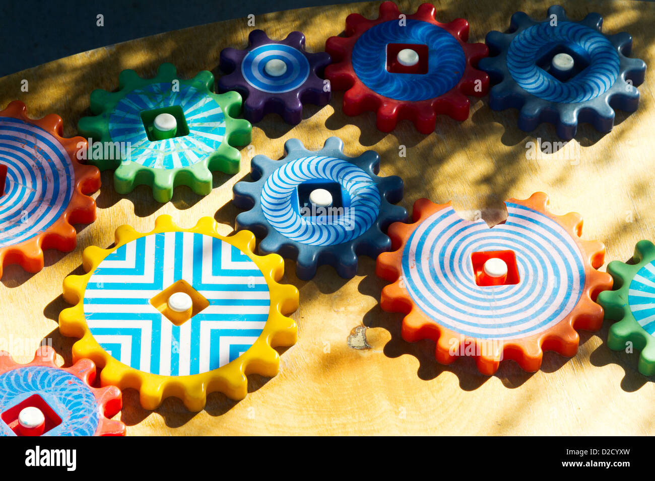 Colorful antique toy with interlocking gears Stock Photo - Alamy Colorful antique toy with interlocking gears Stock Photo - Alamy