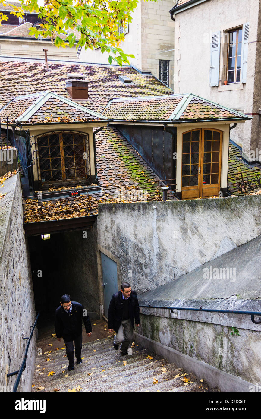 Young men walking up the steps through a passageway at the Vieille ...