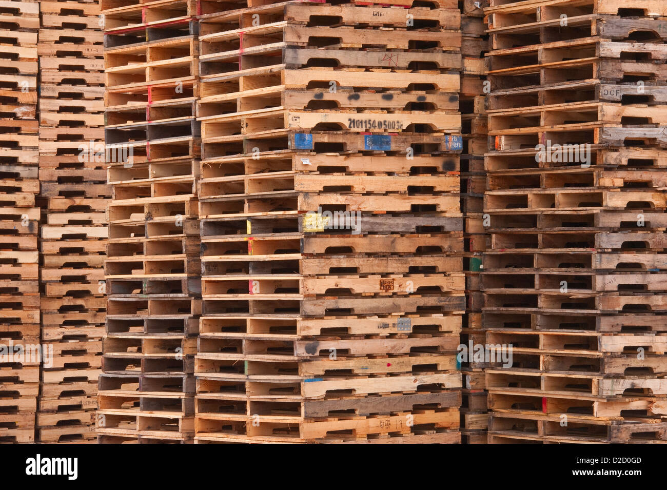 Pallets stacked high at a pallet recycling business in Ludington ...