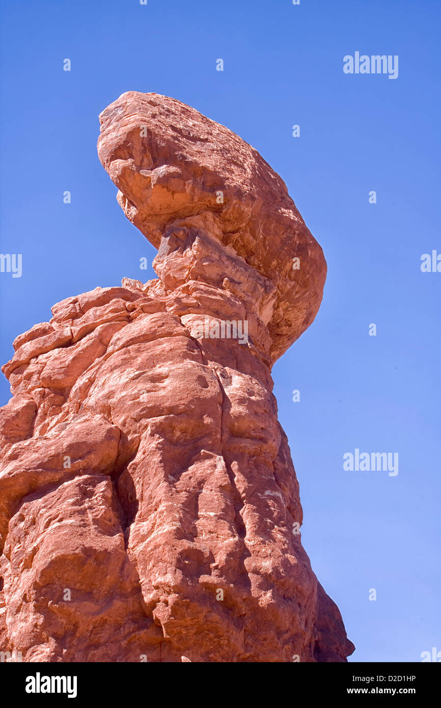 Very large rock balanced on top of a rock pillar. Looks like it could ...