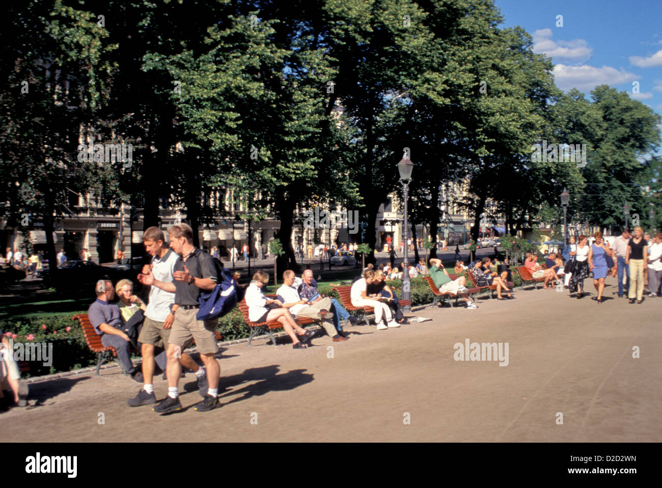 Finland, Helsinki. Esplanadi. People Sitting On Benches And Strolling ...