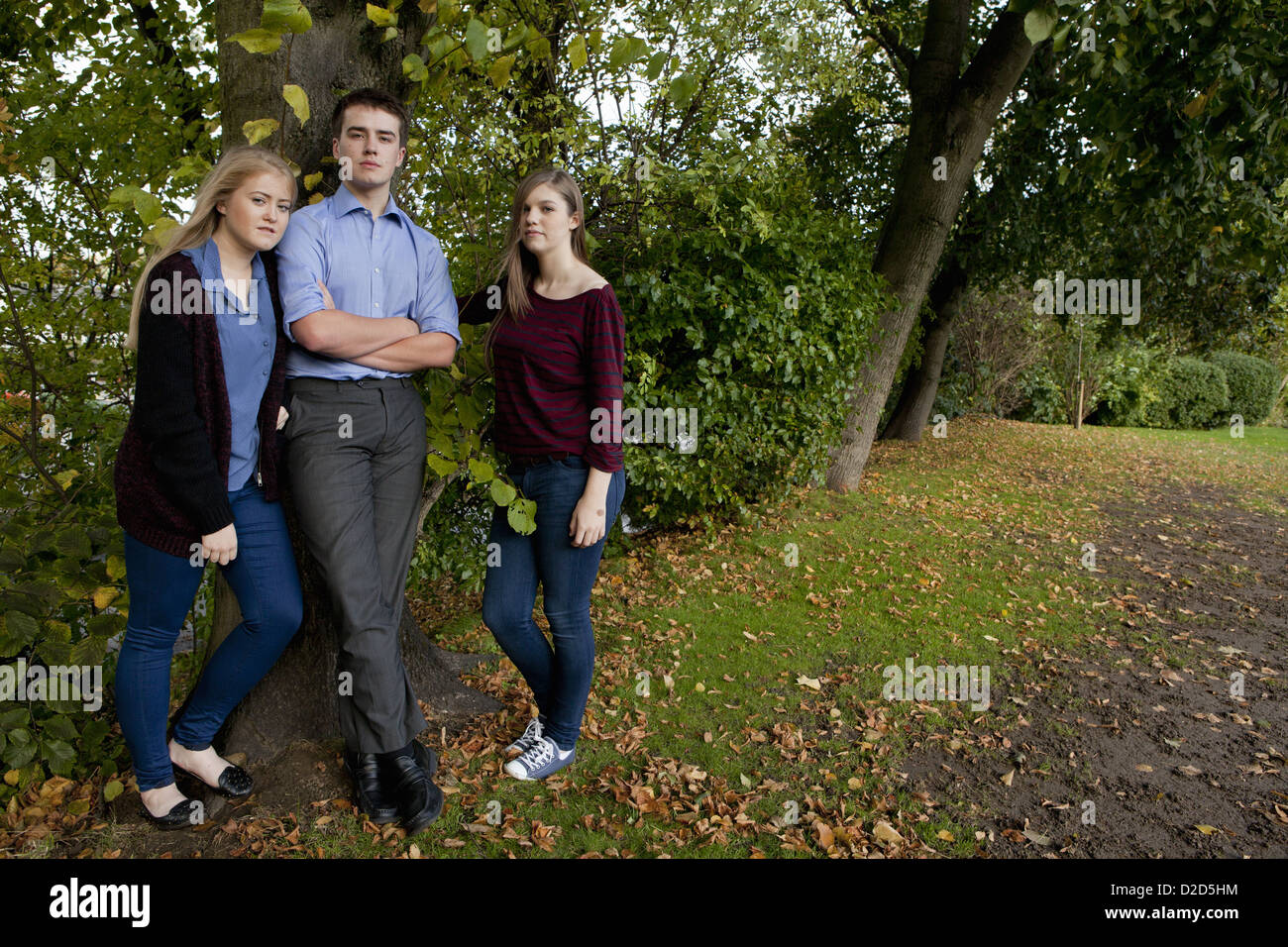 Students standing together in forest Stock Photo - Alamy