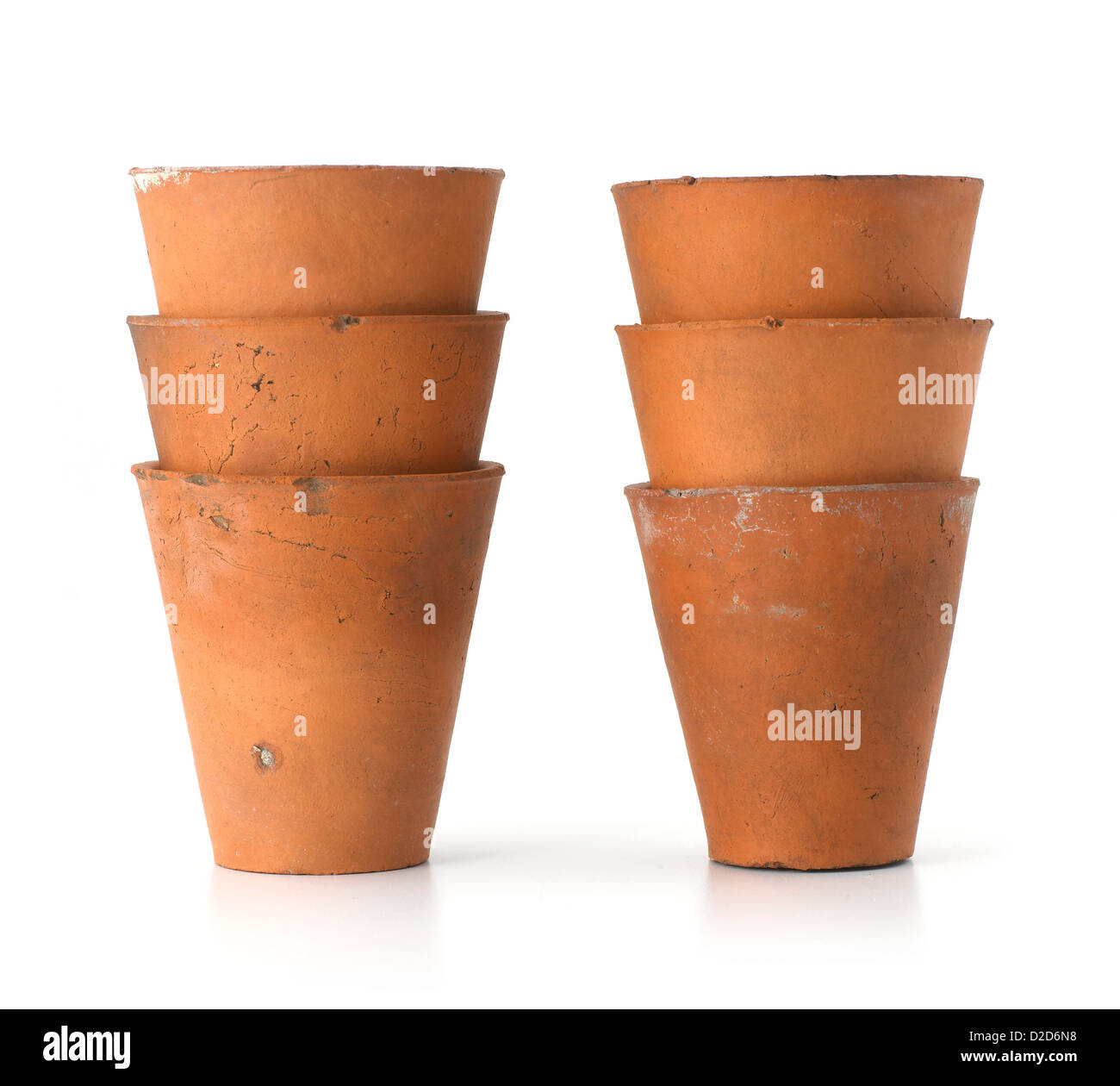 Two stacks of plant pots cut out white background Stock Photo - Alamy
