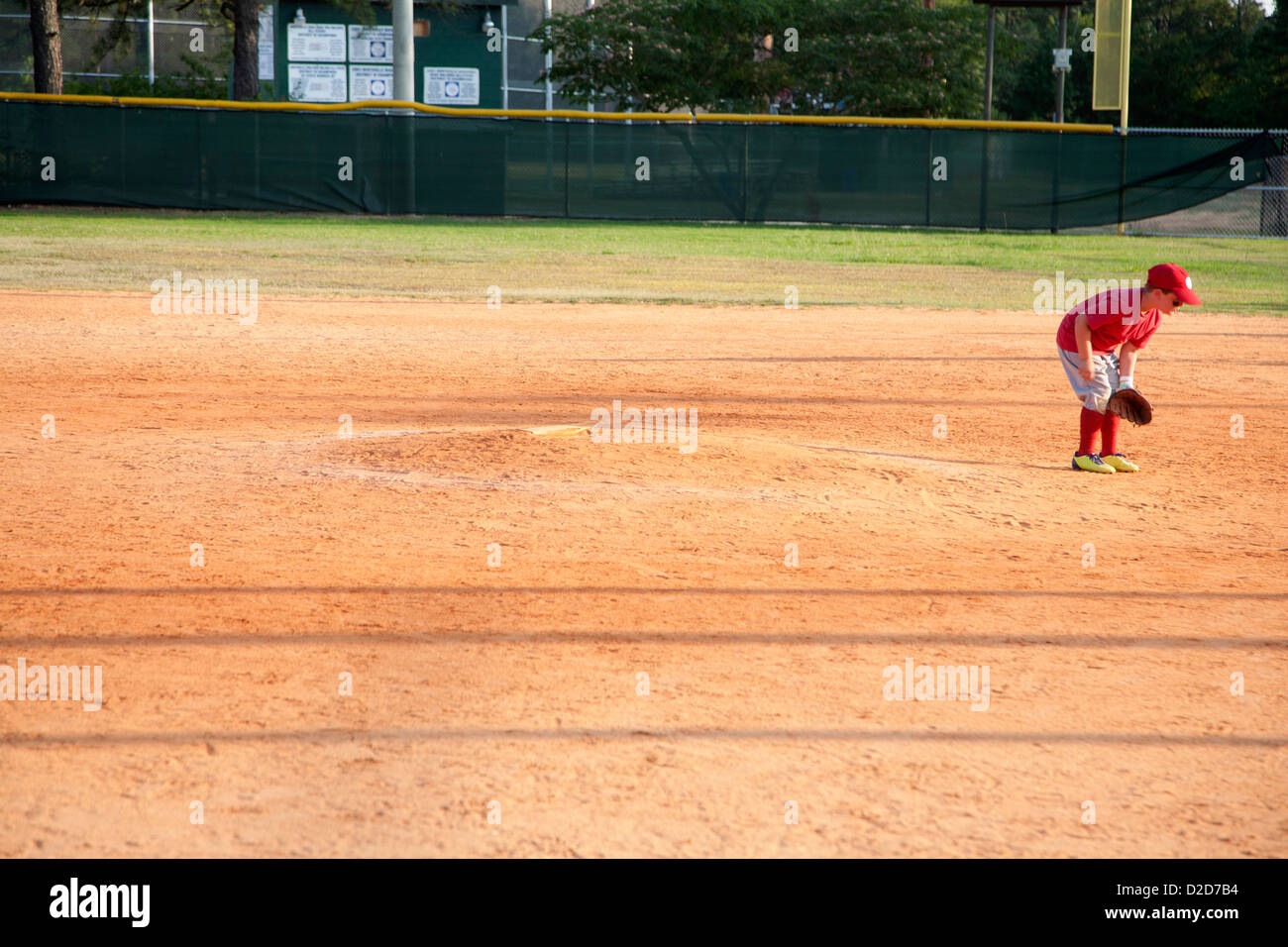 A young baseball player on a baseball diamond Stock Photo - Alamy