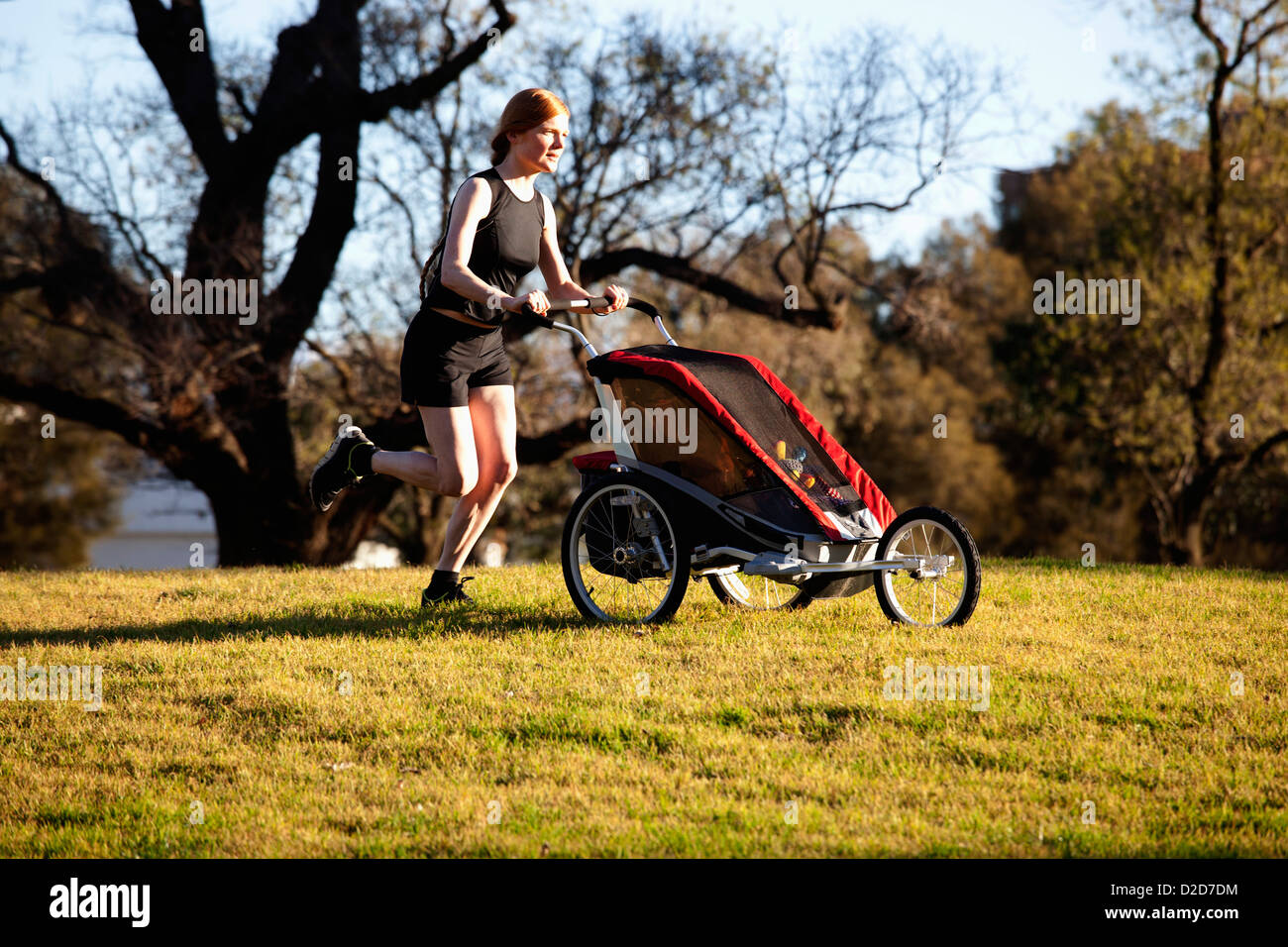 Woman pushing pram in hi-res stock photography and images - Alamy