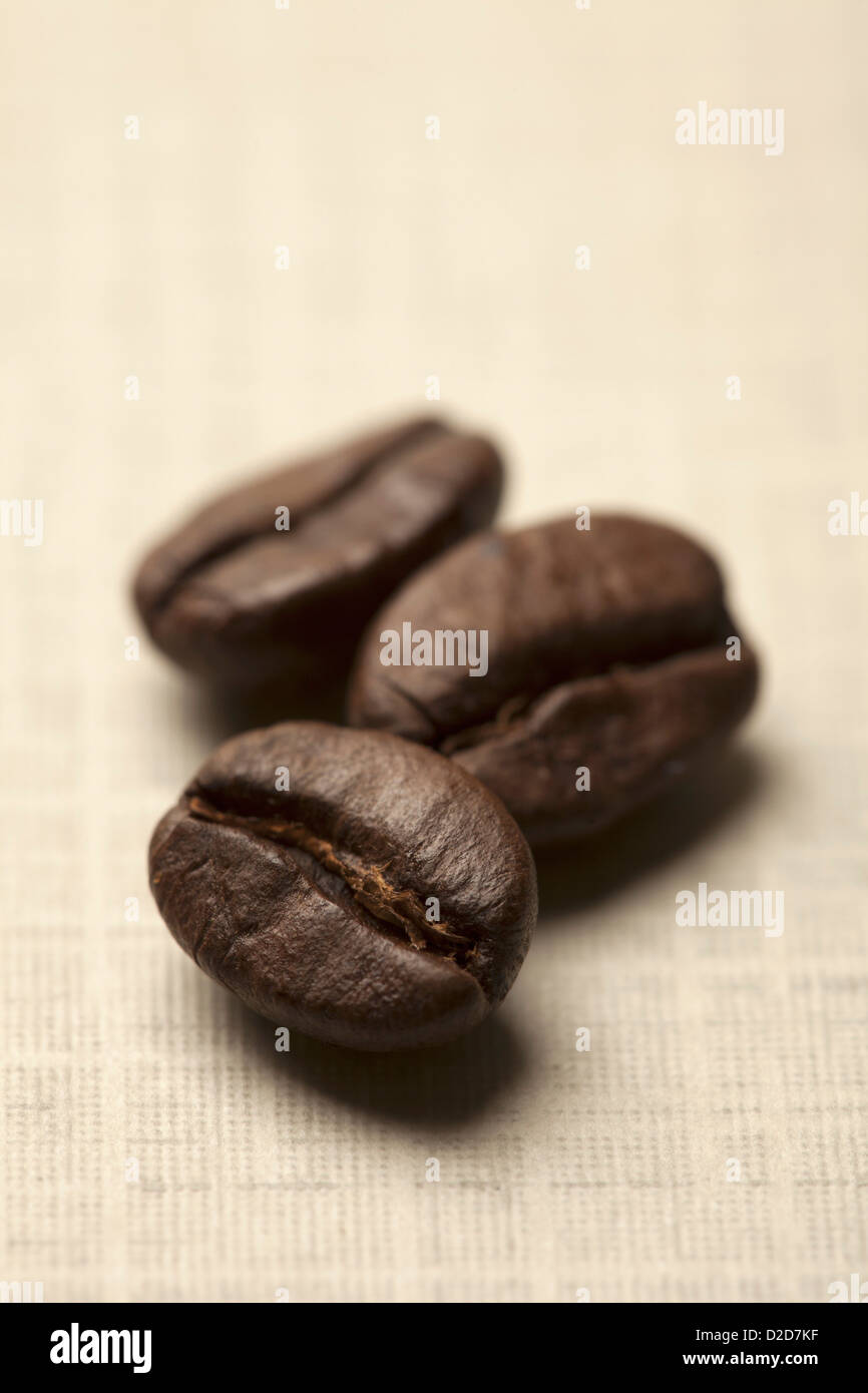 Three coffee beans Stock Photo - Alamy