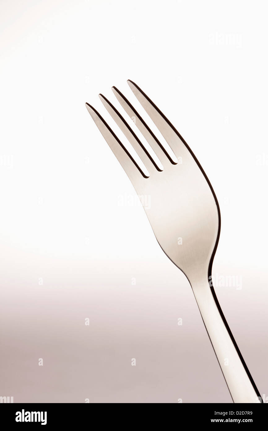 A single fork Stock Photo - Alamy