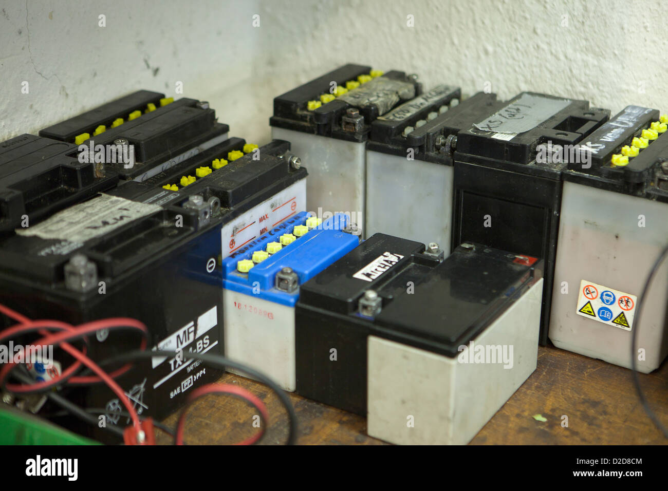 Motorcycle batteries on table Stock Photo - Alamy