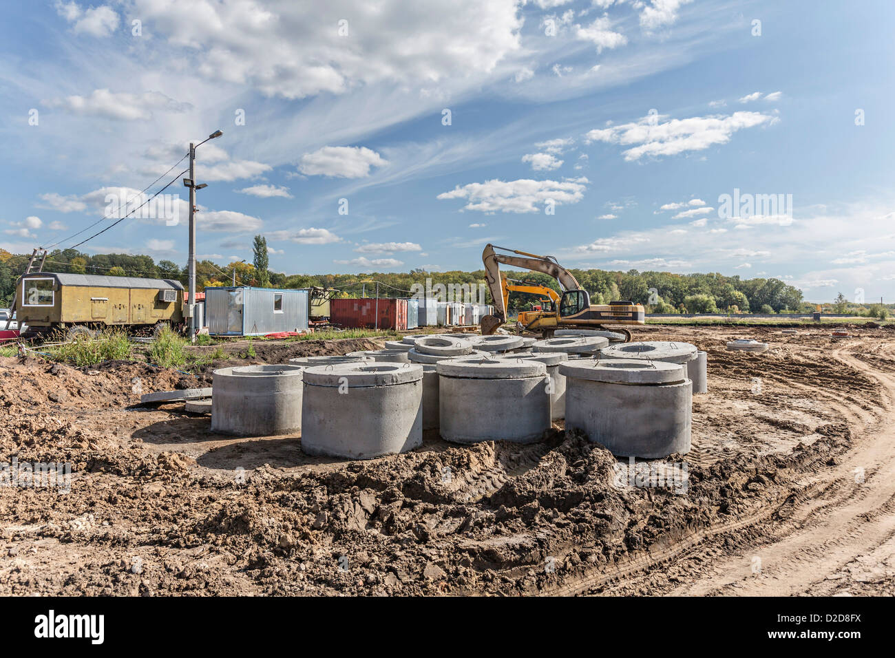 Concrete cylinders on construction site Stock Photo - Alamy