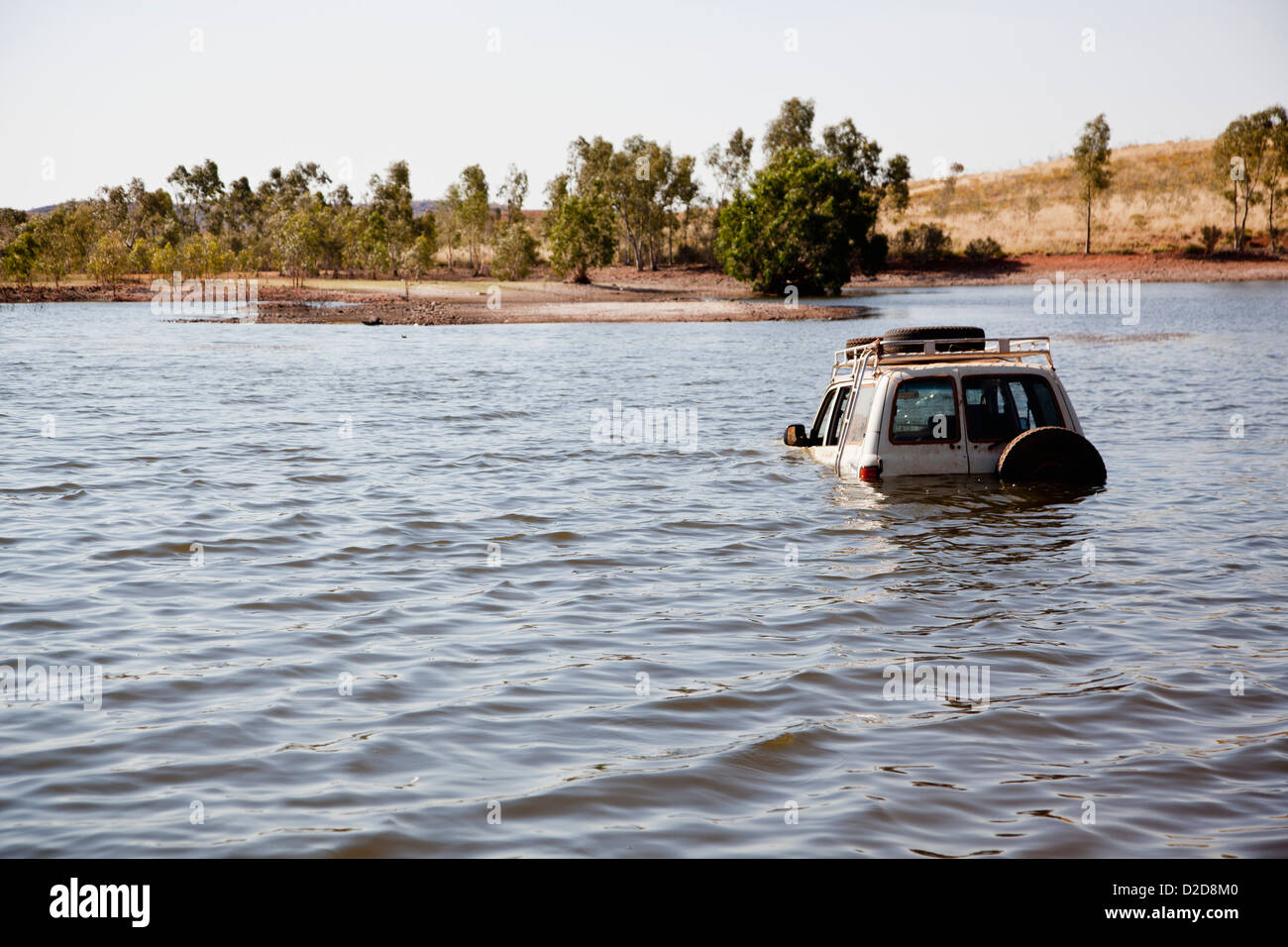 A 4x4 driving through deep water Stock Photo - Alamy
