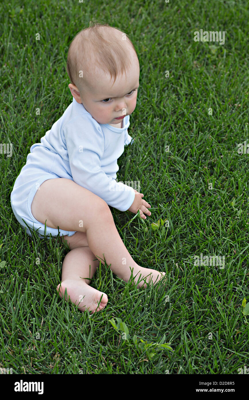Baby in the garden Stock Photo - Alamy