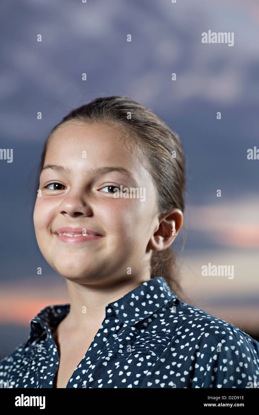 A happy girl smiling into the camera Stock Photo - Alamy