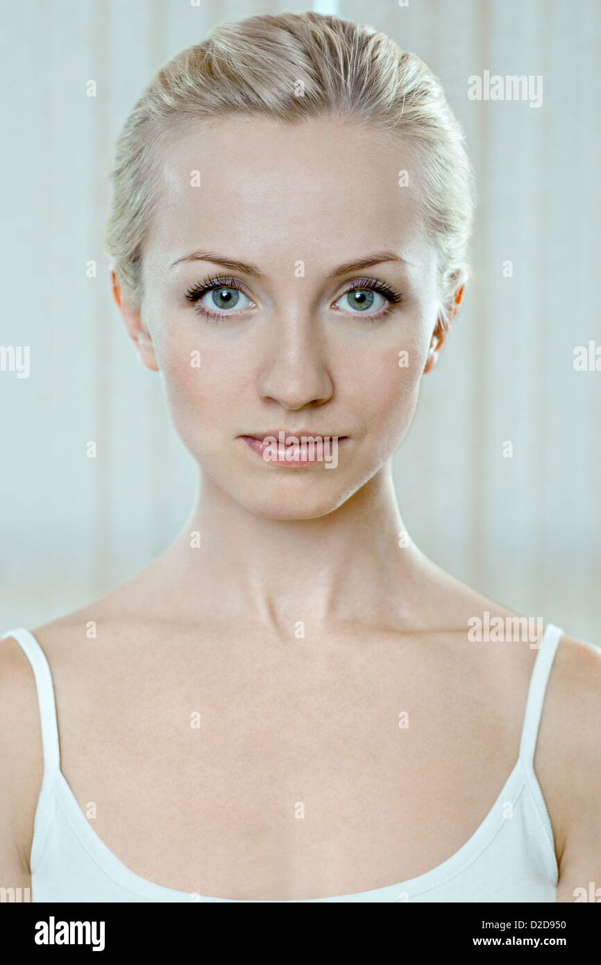 Portrait of blond woman wearing tank top hi-res stock photography and ...