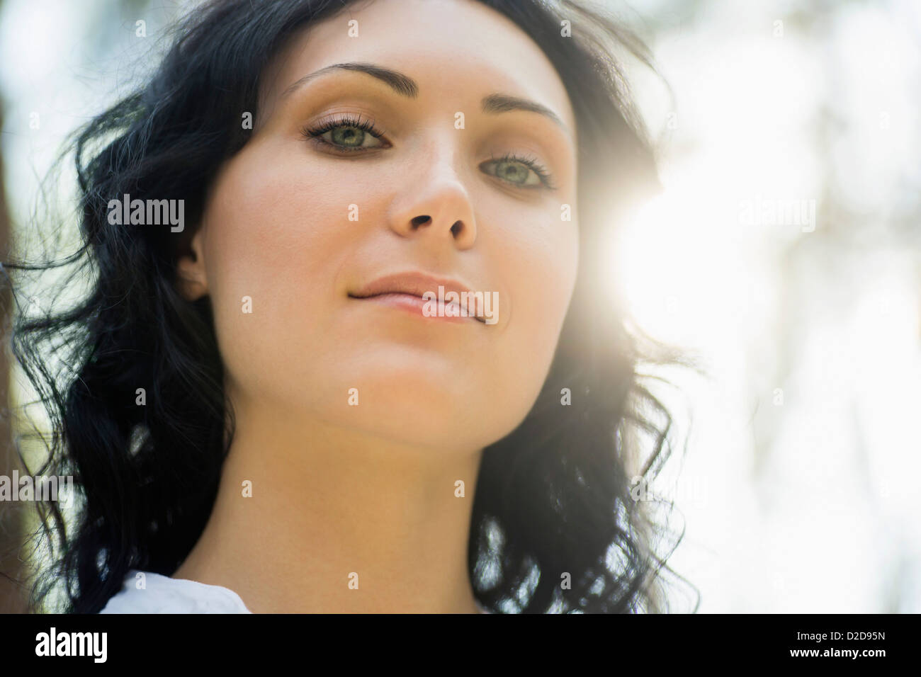 Beautiful woman looking back hi-res stock photography and images - Alamy