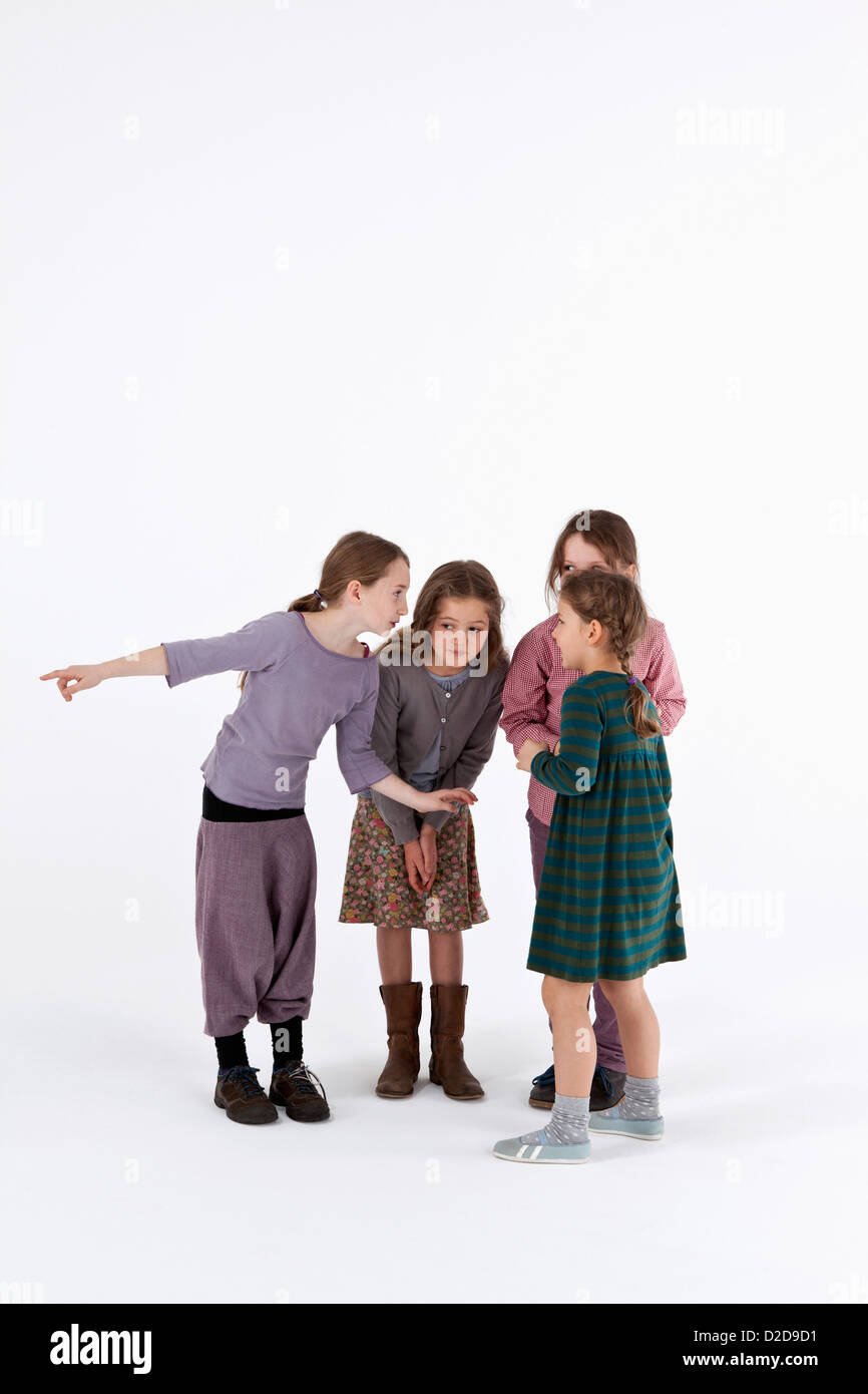 A group of gossiping little girls Stock Photo - Alamy
