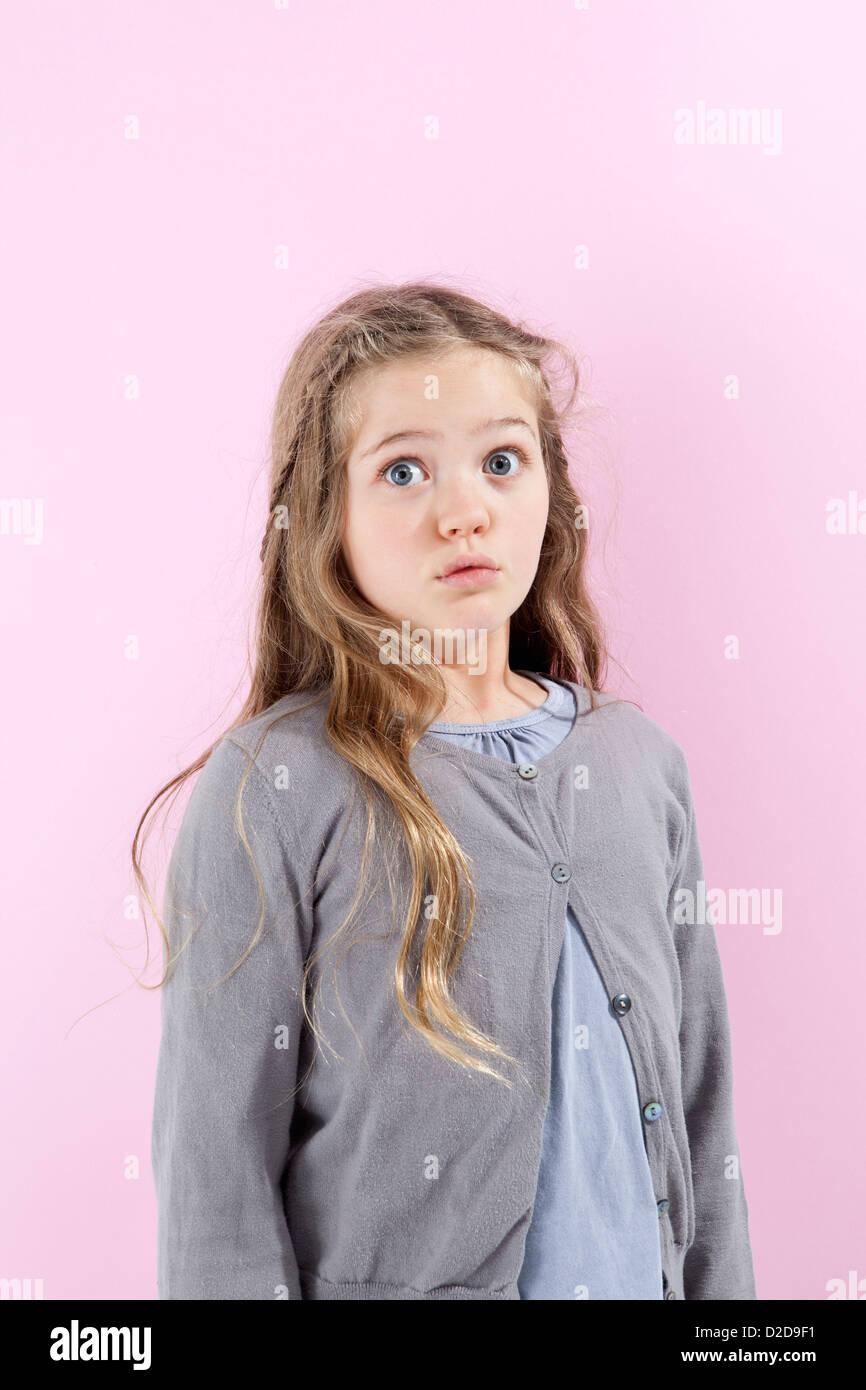 A girl with an expression of disbelief on her face Stock Photo - Alamy