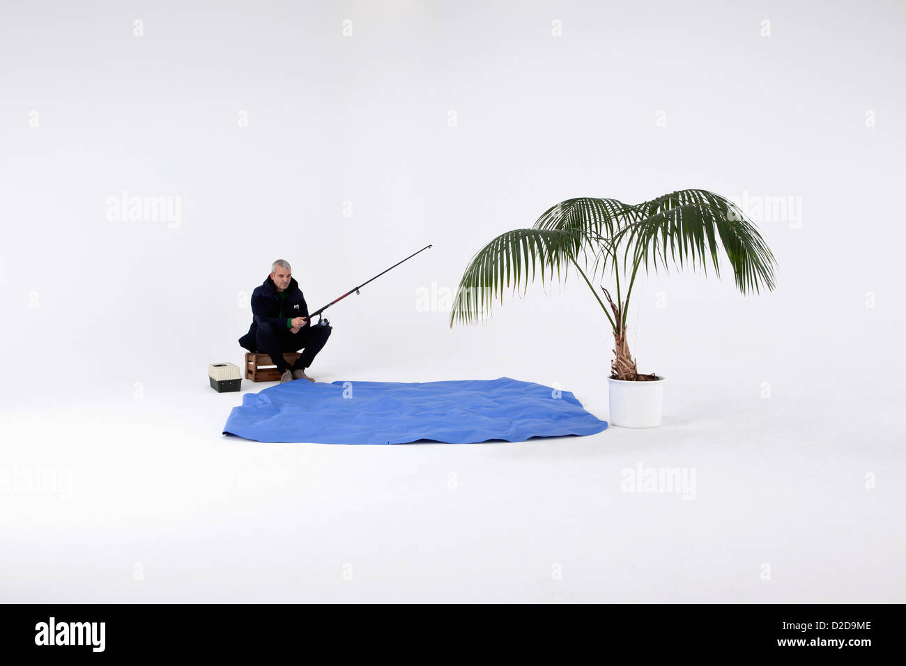 A man pretend fishing in pretend water Stock Photo - Alamy