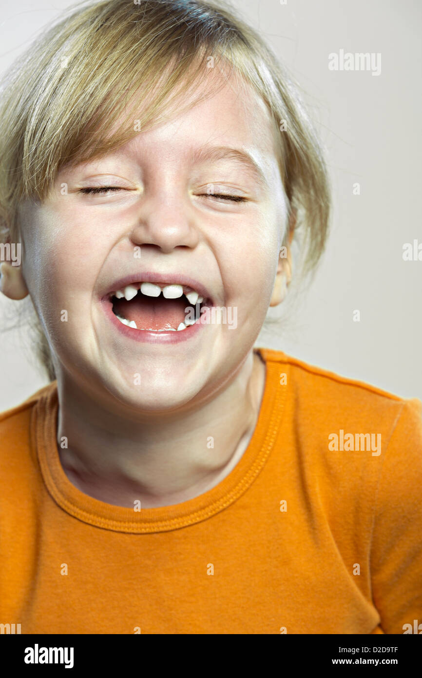 A young girl laughing joyously Stock Photo - Alamy