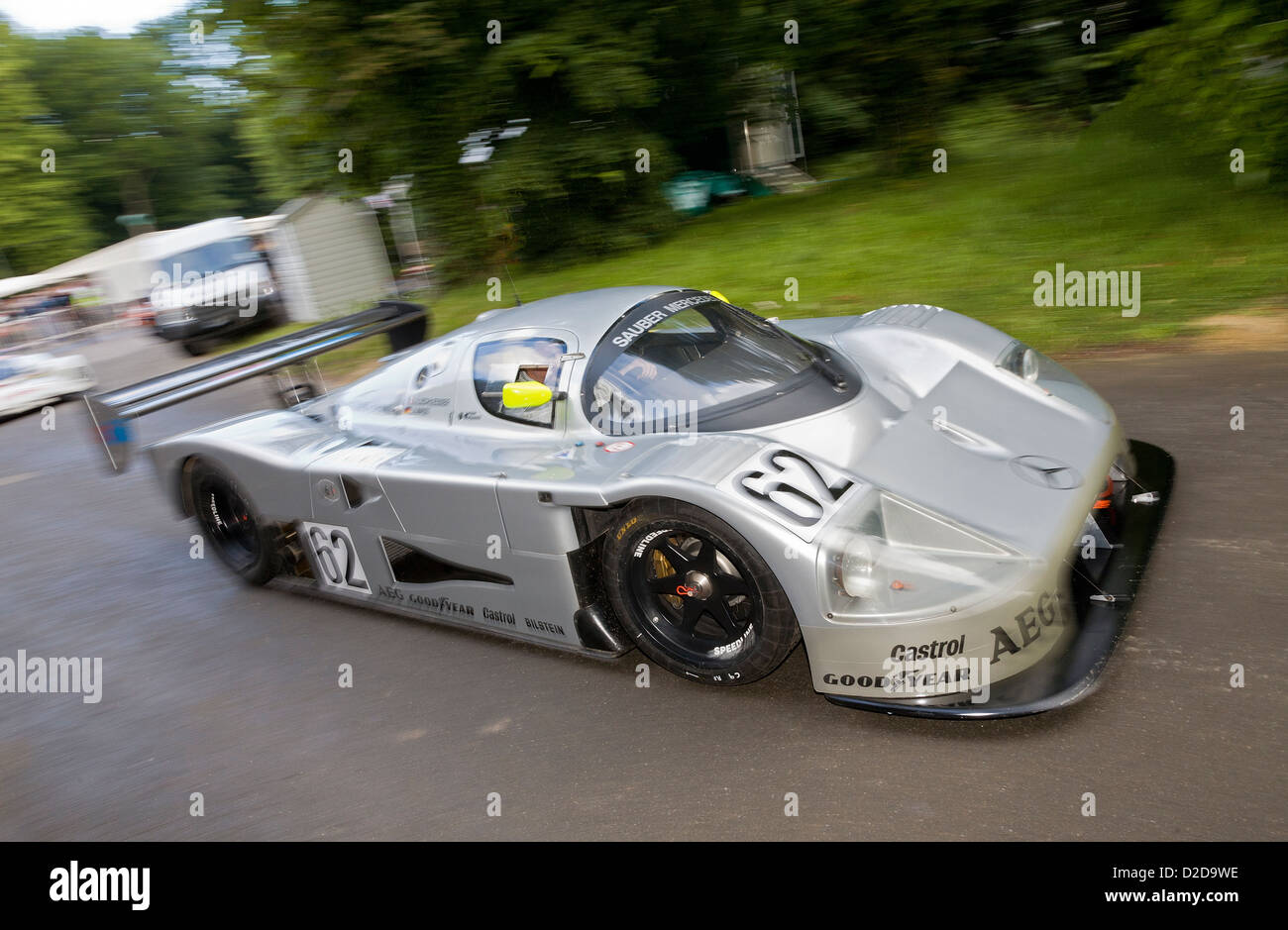 1989 Sauber-Mercedes C9 with driver Bob Berridge leaves the paddock at ...