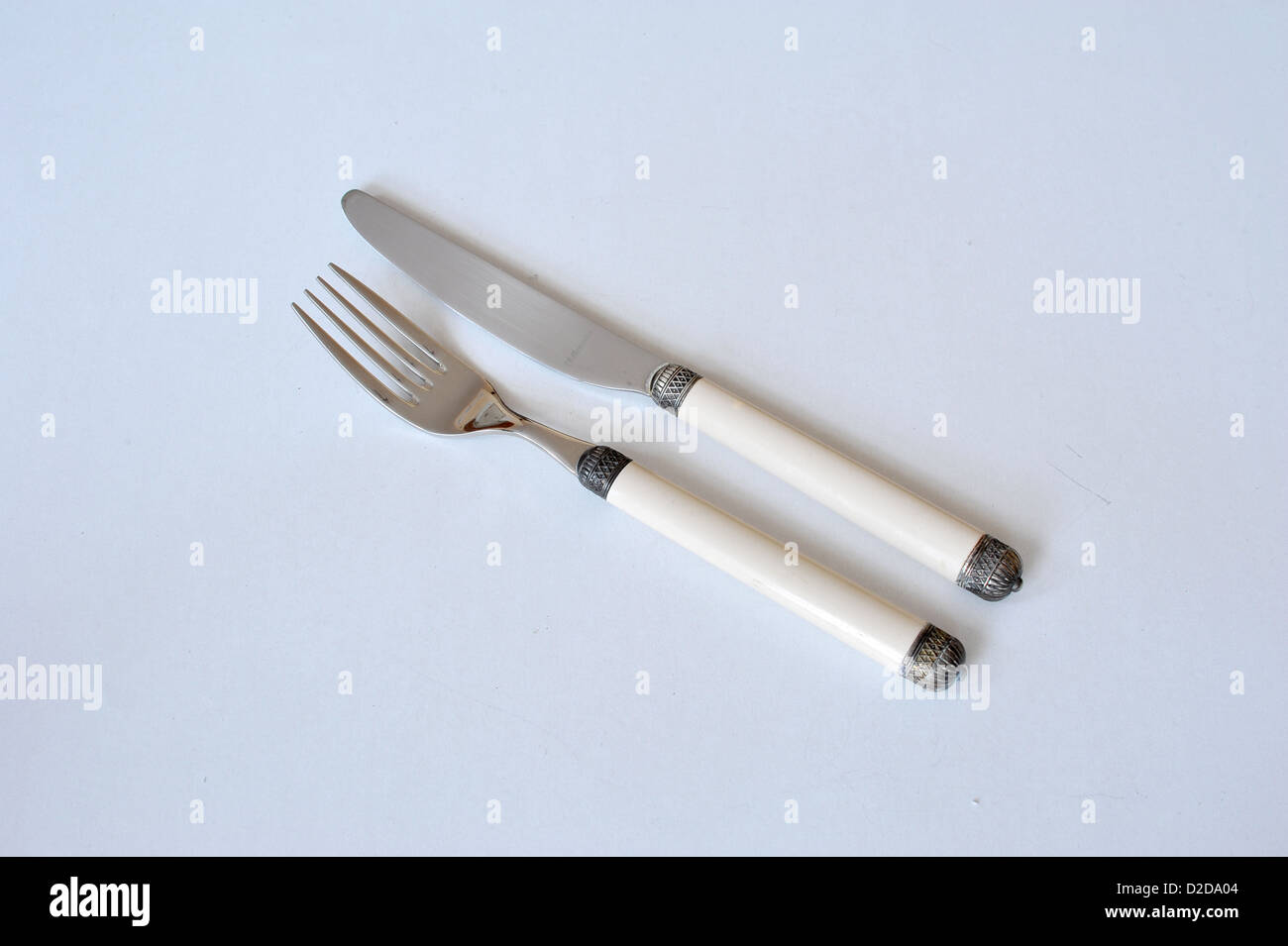 steel kitchen knife and prong Stock Photo - Alamy