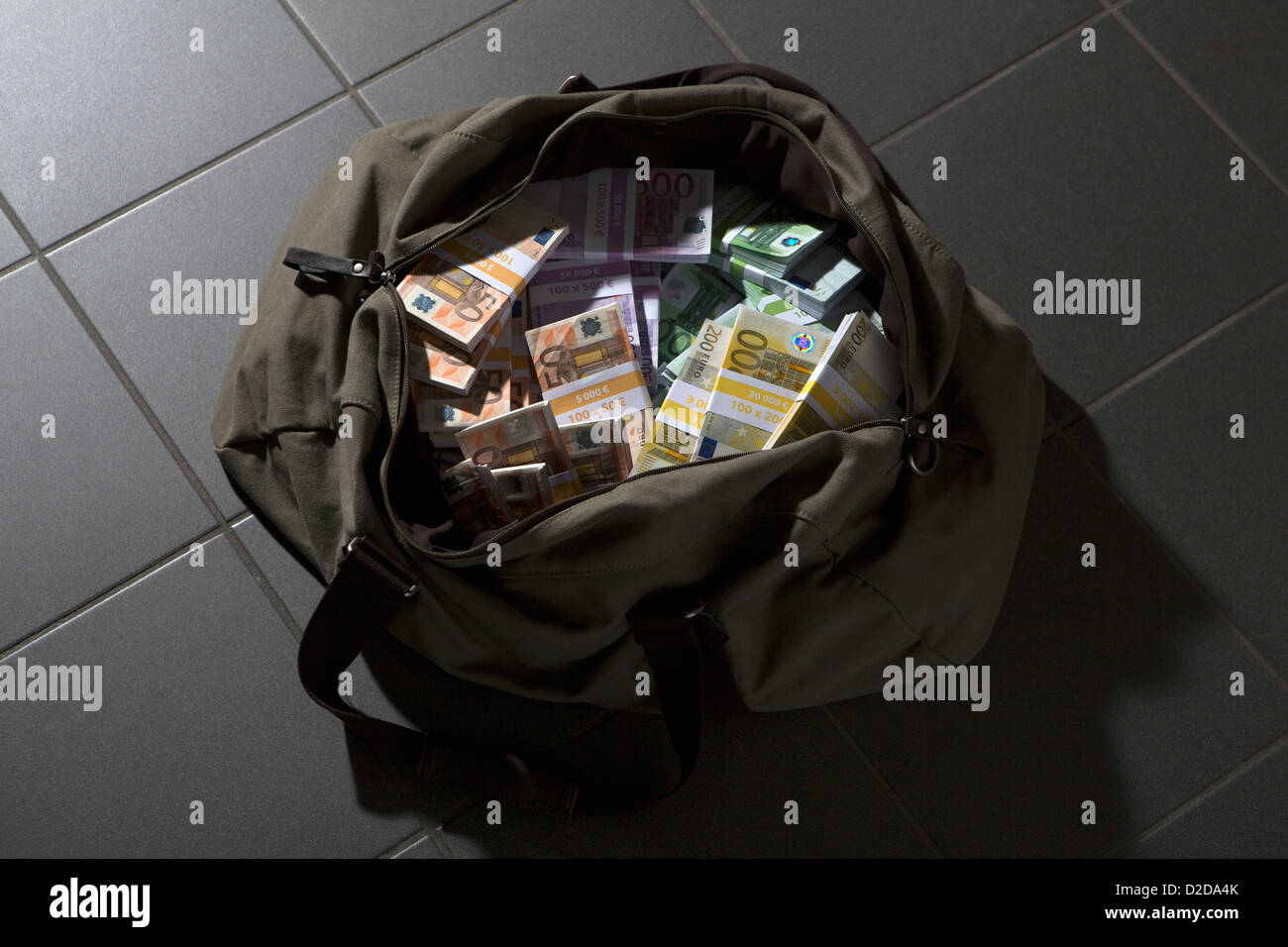 A bag full of large billed Euro banknotes Stock Photo - Alamy